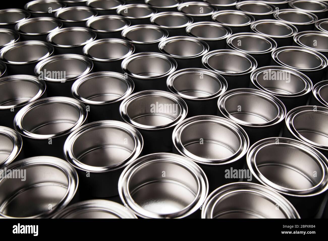 Metal tin paint cans background Stock Photo - Alamy