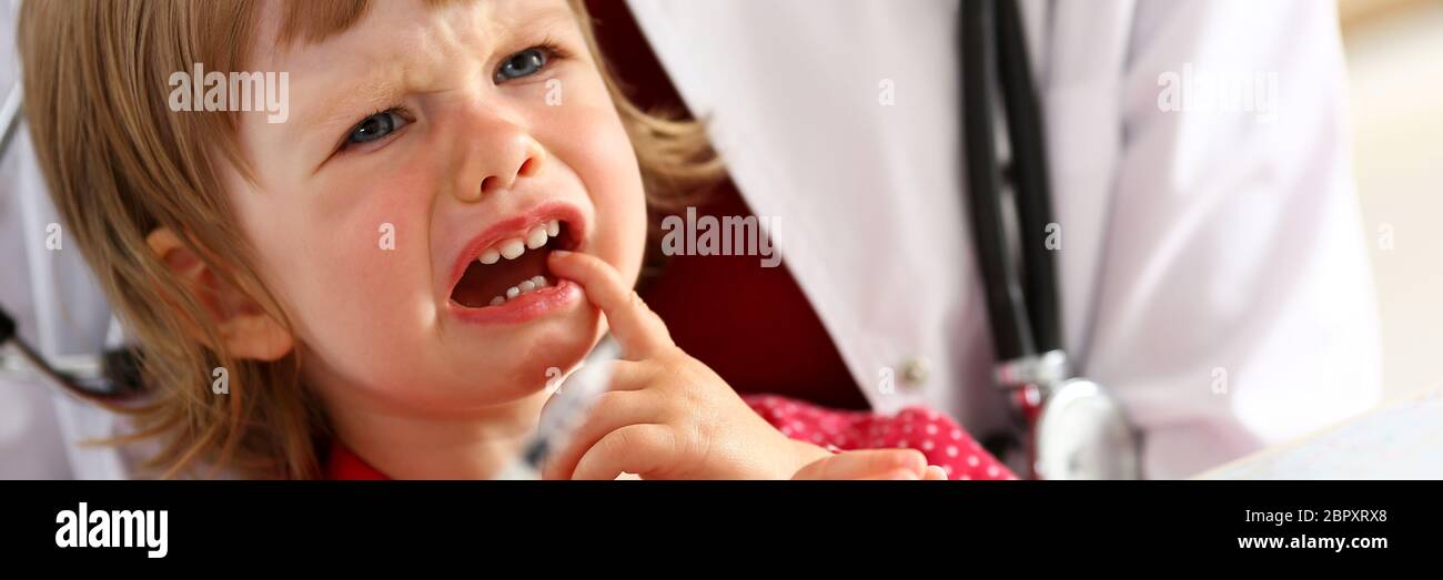 Little scared child at doctor reception make insulin shot Stock Photo ...