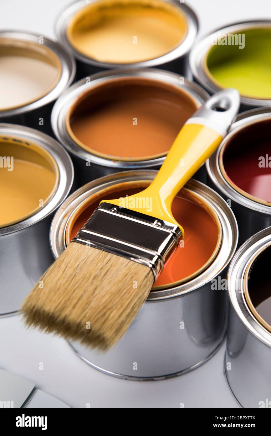 Tin cans with paint, brushes and bright palette of colors Stock Photo ...