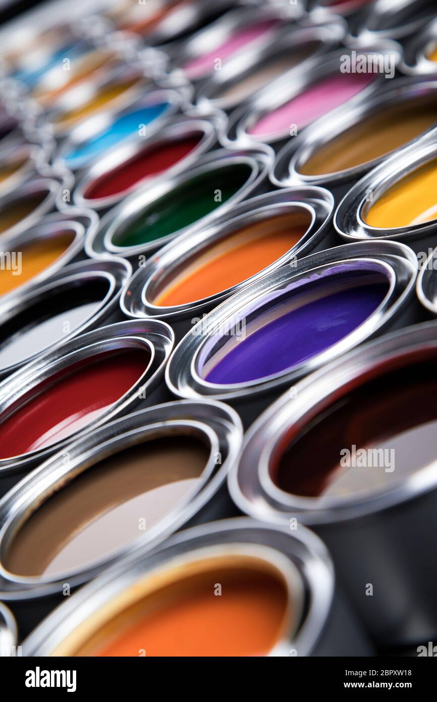 Creativity concept group of tin metal cans with color paint Stock Photo ...