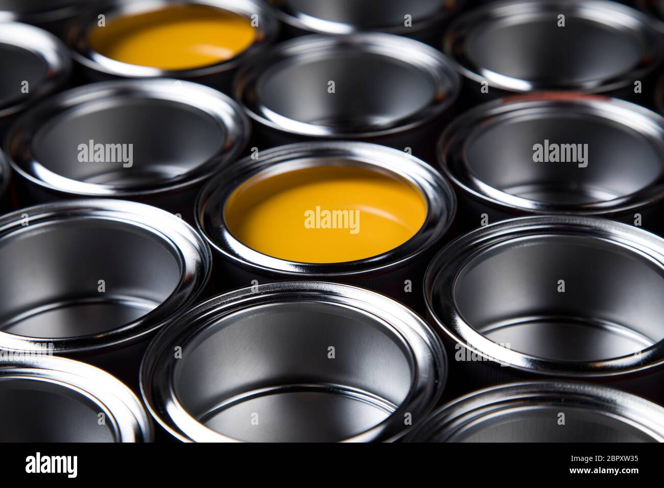 Metal tin paint cans background Stock Photo - Alamy