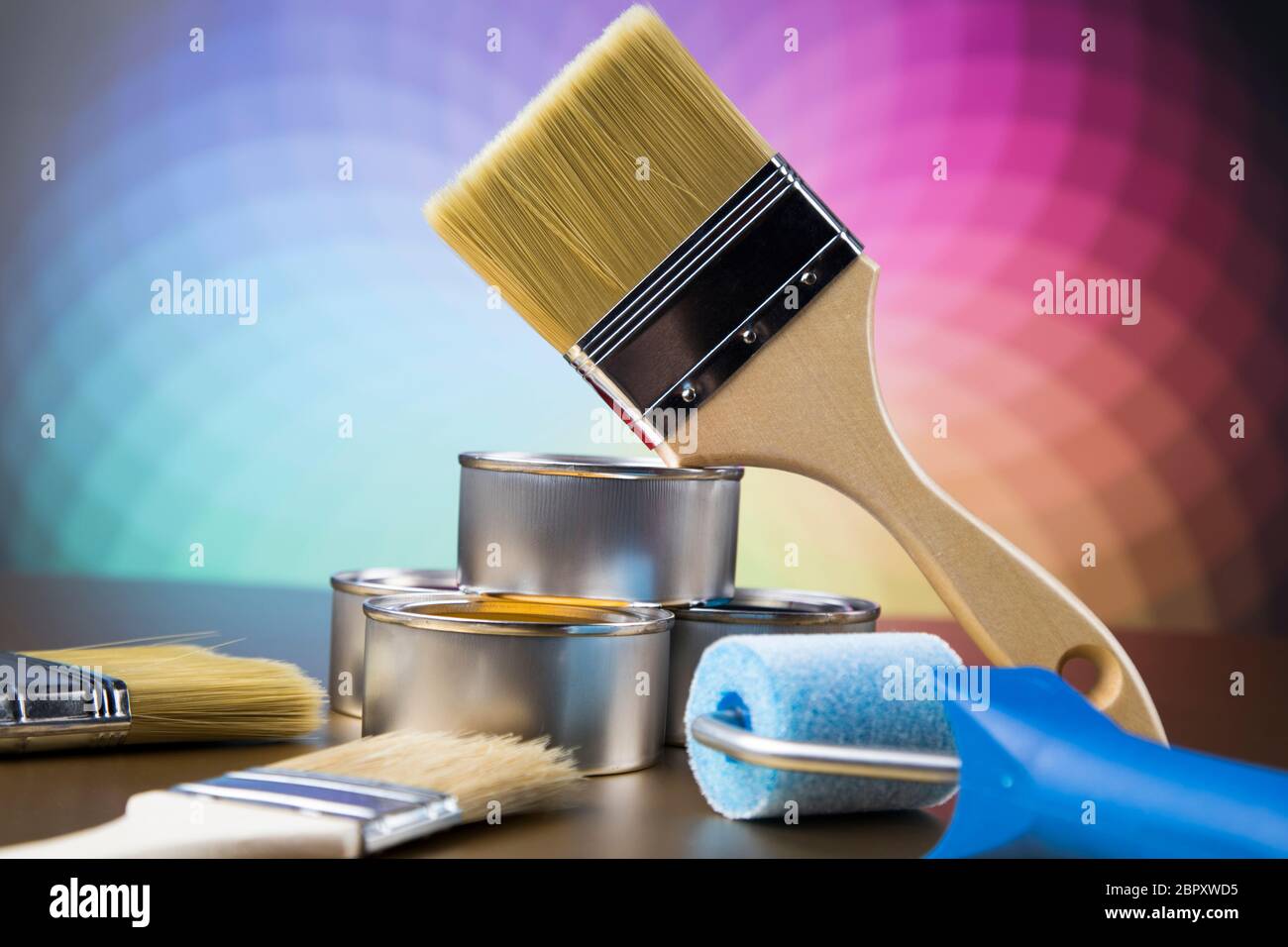 Metal tin cans with color paint and paintbrush Stock Photo - Alamy