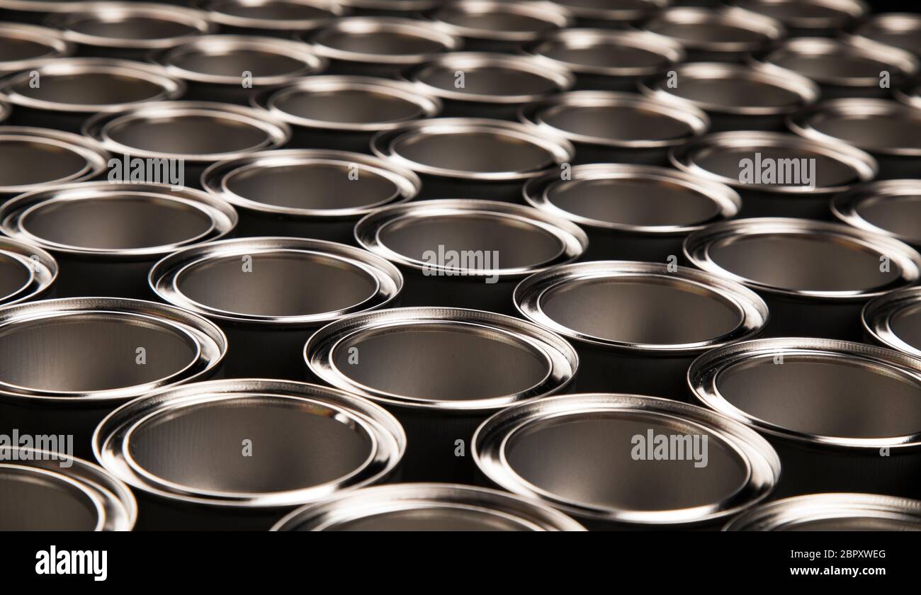 Metal tin paint cans background Stock Photo - Alamy
