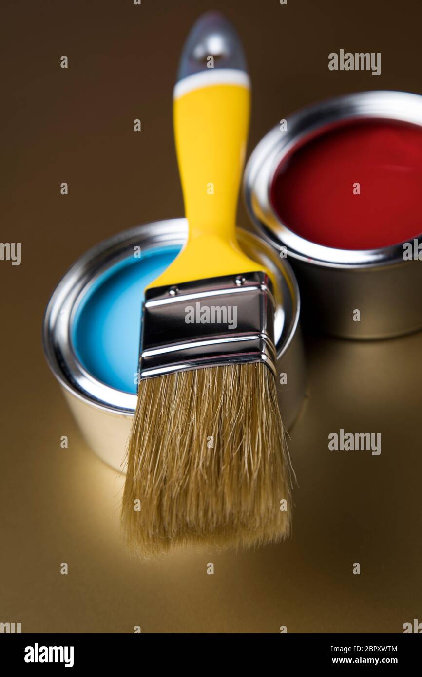 Tin cans with paint, brushes and bright palette of colors Stock Photo ...
