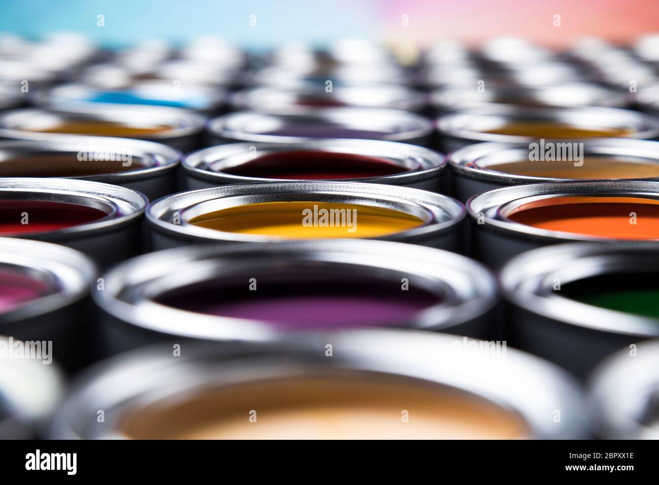 Collection of colored paints cans Stock Photo - Alamy