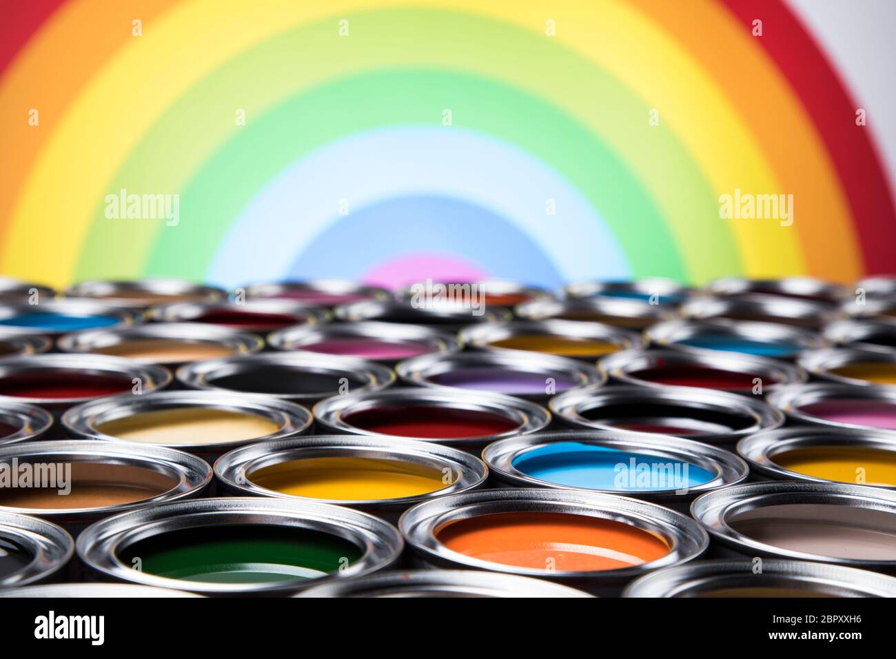 Collection of colored paints cans Stock Photo - Alamy
