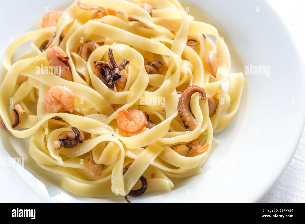 Tagliatelle pasta with seafood Stock Photo - Alamy