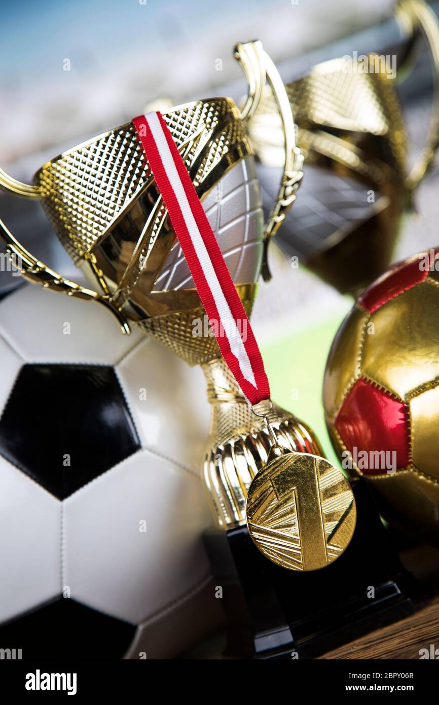 Winner trophy, Sport equipment and balls Stock Photo - Alamy