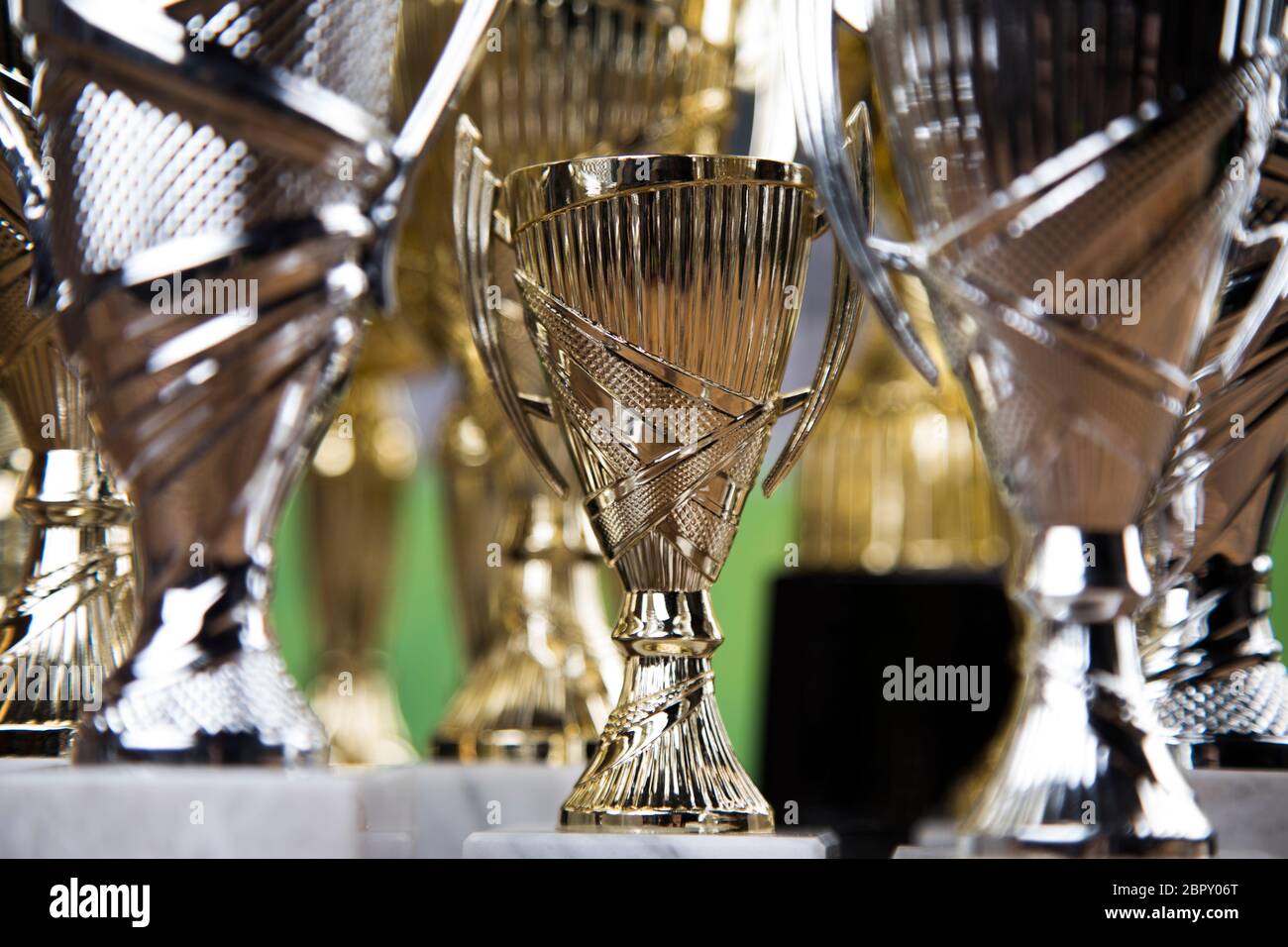 Award winning and championship concept, trophy cup on sport background ...