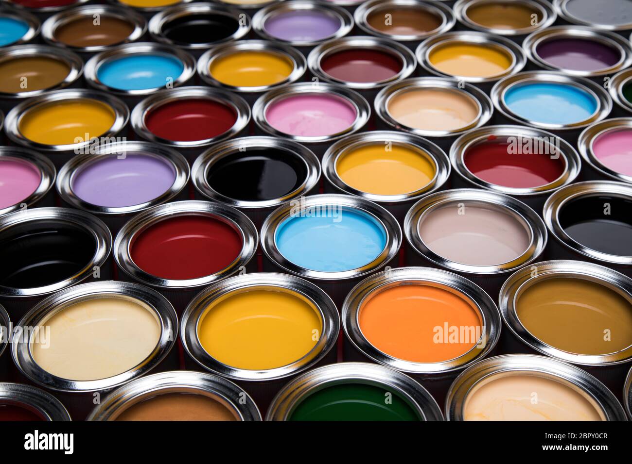 Collection of colored paints cans Stock Photo - Alamy