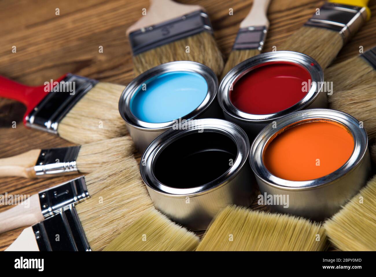 Tin cans with paint, brushes and bright palette of colors Stock Photo ...