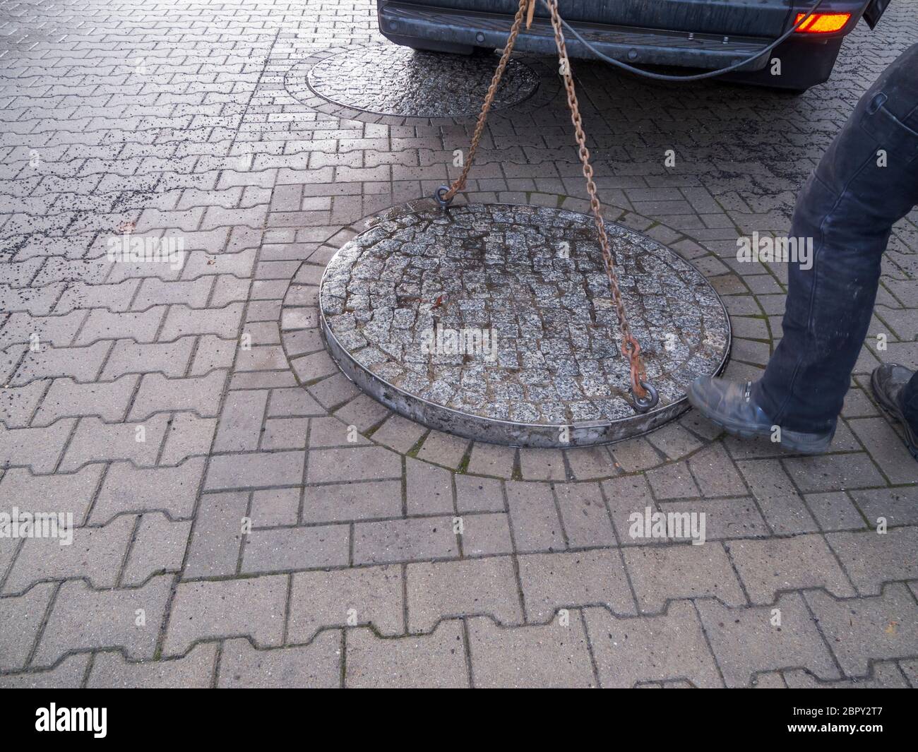 Concrete manhole covers hi-res stock photography and images - Alamy