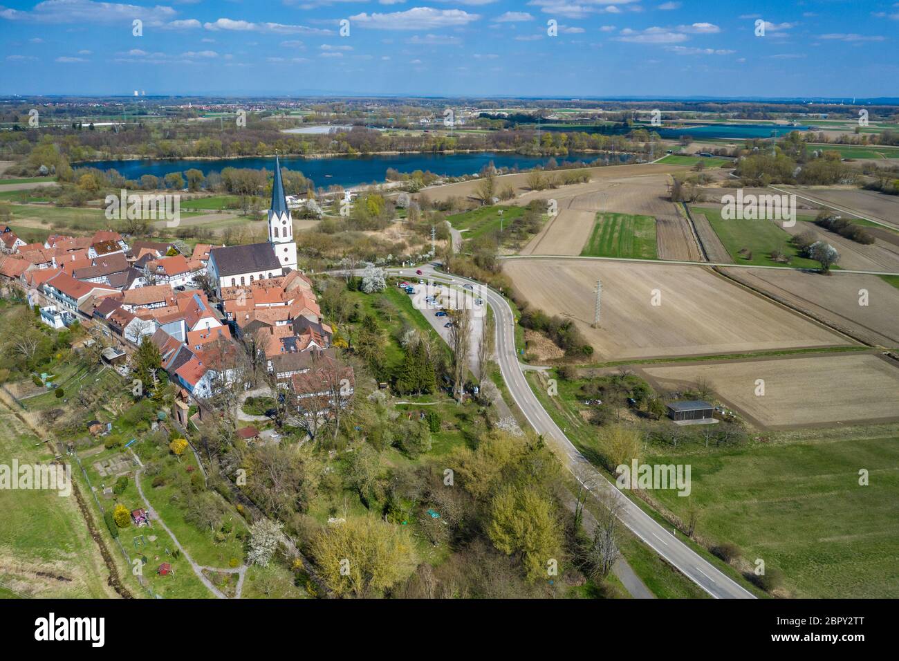 aerial view of the historic old town of the village Jockgrim with lake ...