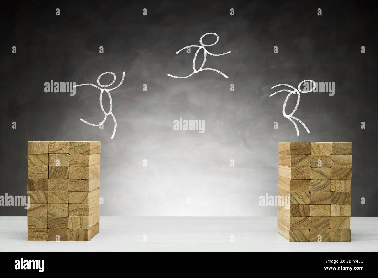 Rise and improvement concept. Human shape jumps between two blocks ...
