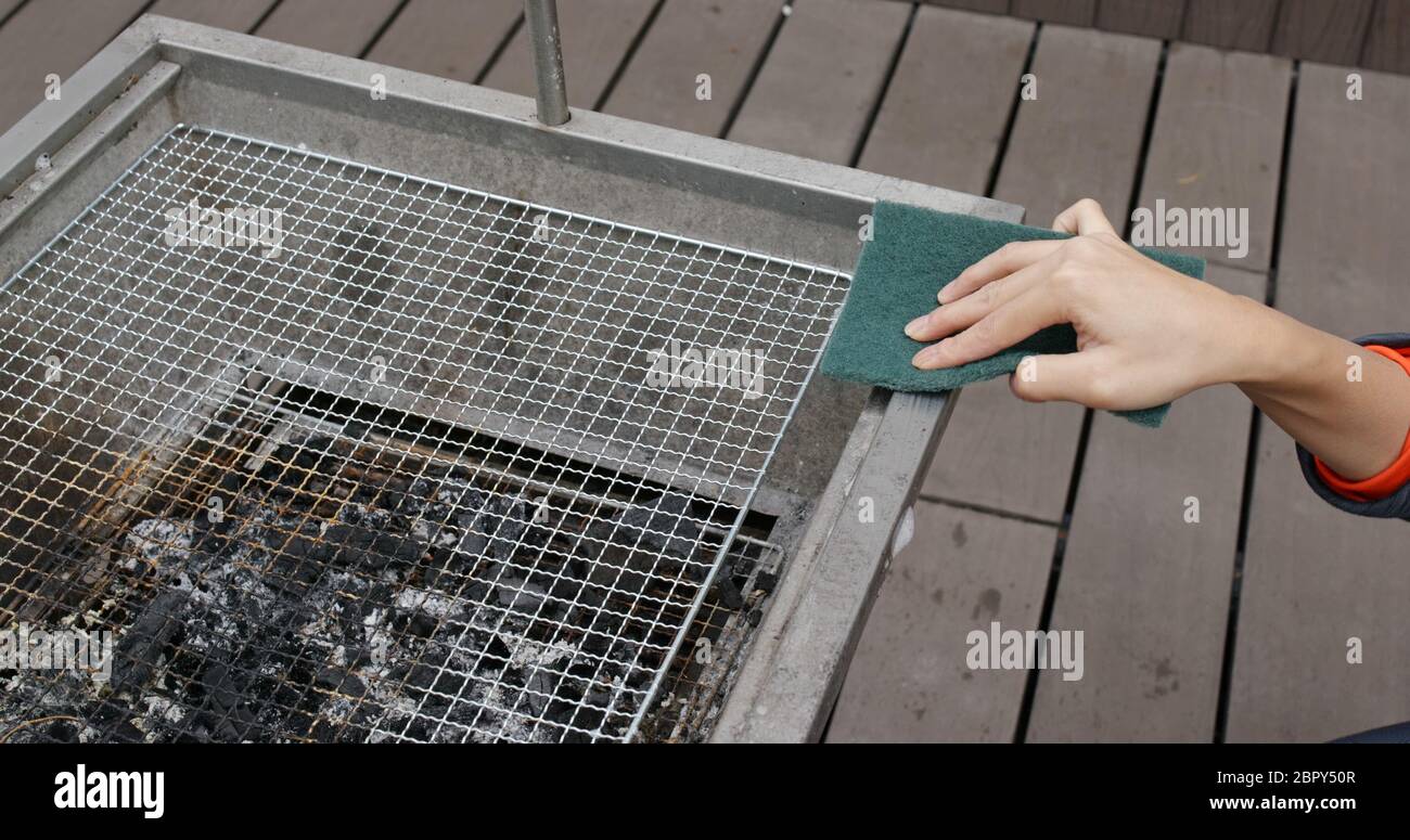 Wash BBQ oven at outdoor Stock Photo - Alamy