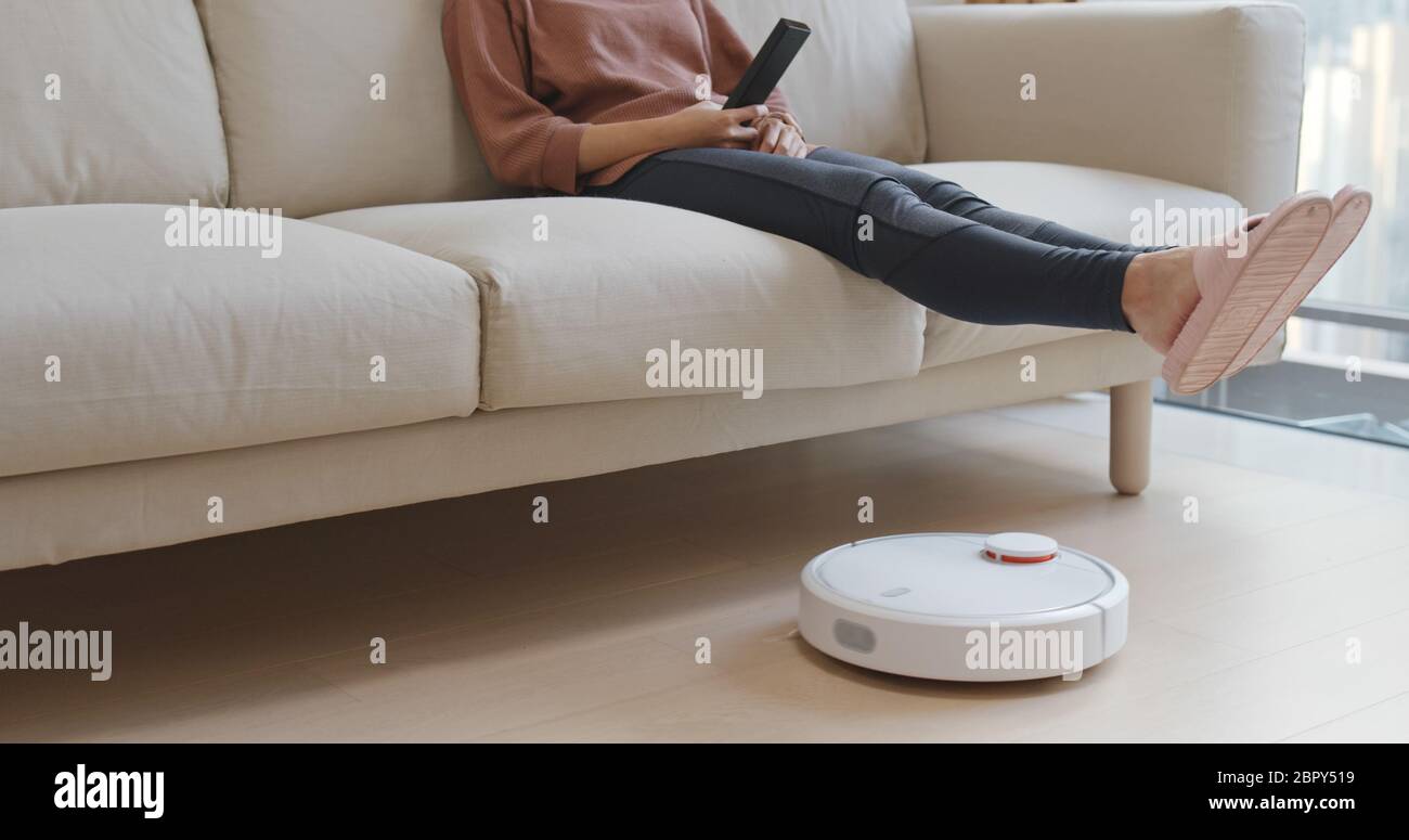 Asian woman vacuuming hi-res stock photography and images - Alamy