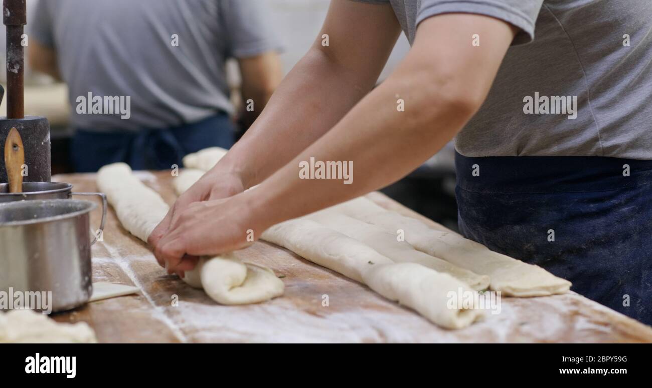 Chinese master making white bread Stock Photo - Alamy