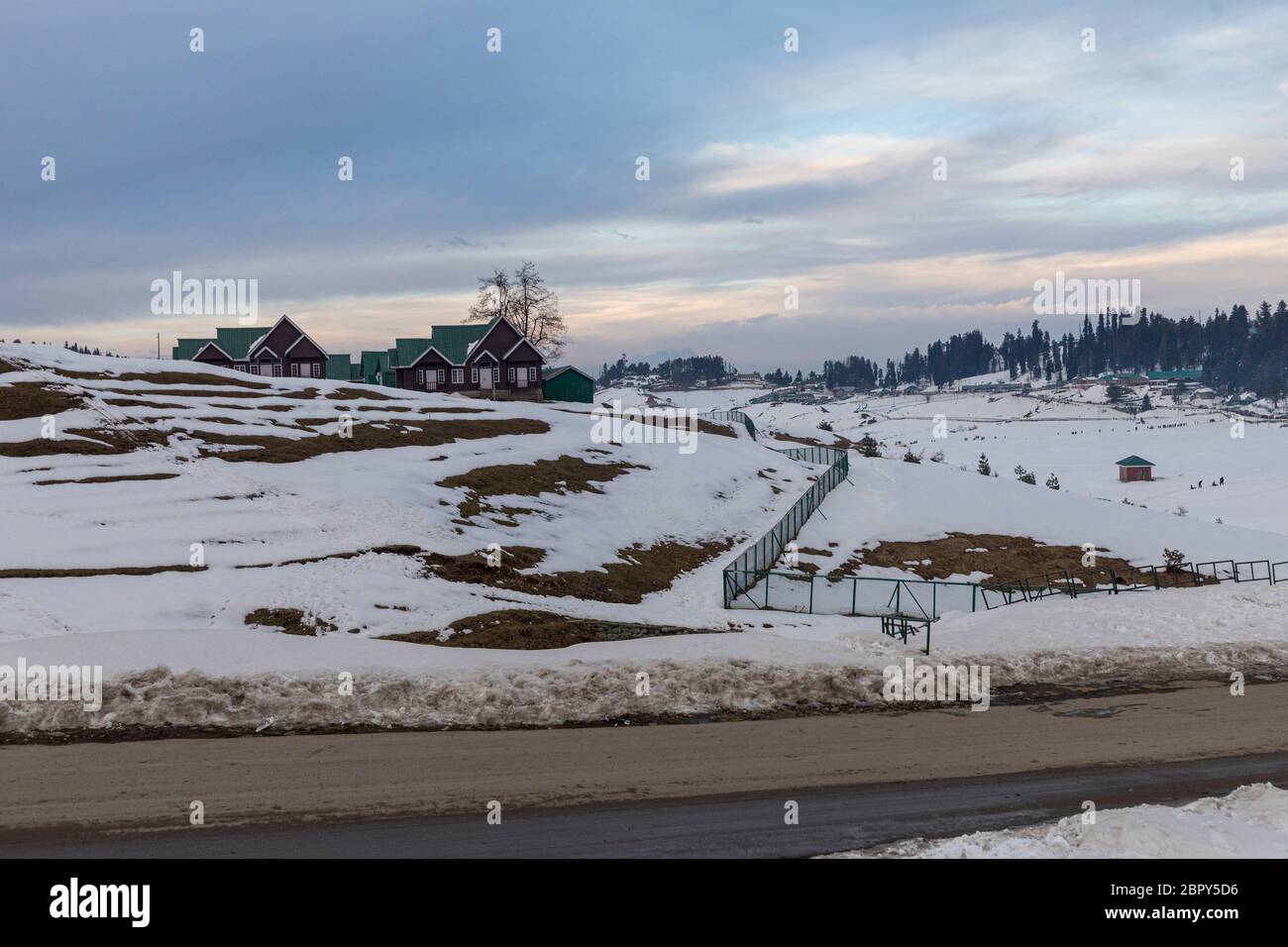 Hills covered with snow in the tourist town of Pahalgam in the state of ...