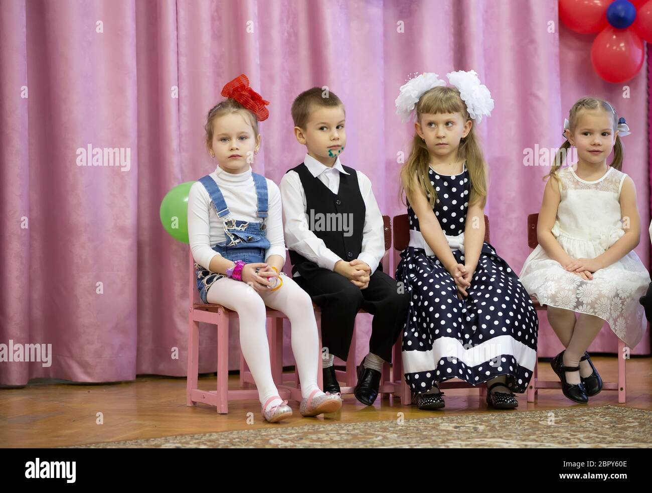 Morning party in kindergarten. Funny children from kindergarten at the ...