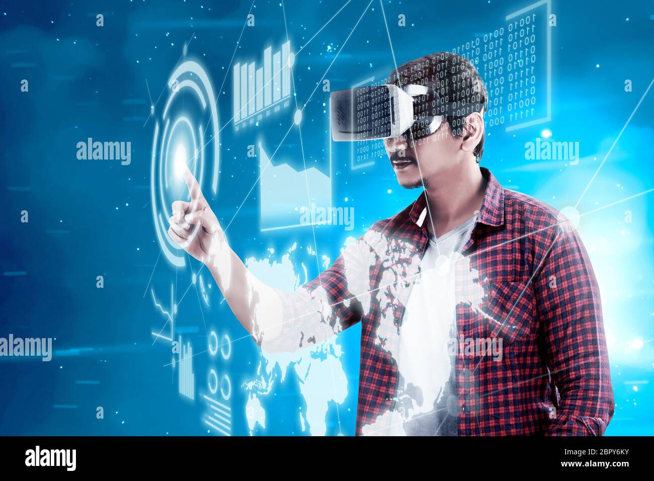 Asian man touching blue sphere on digital interface with virtual ...