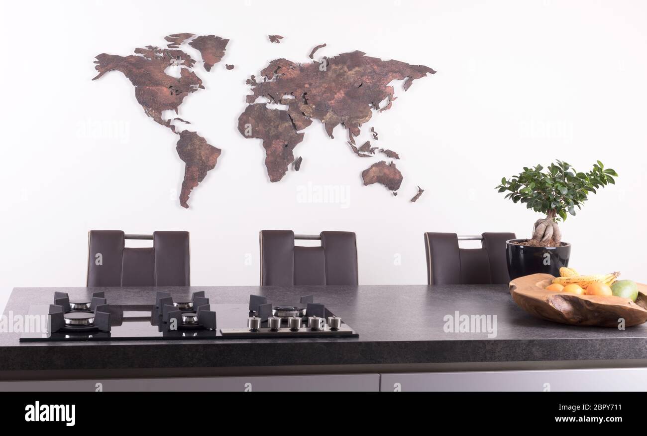 Roughly outlined world map on a kitchen wall Stock Photo - Alamy