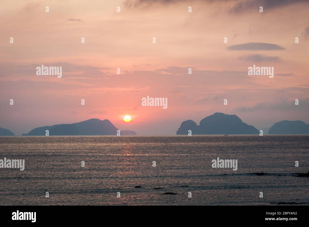 Sunset at Las Cabanas Beach, El Nido, Palawan, The Philippines Stock ...