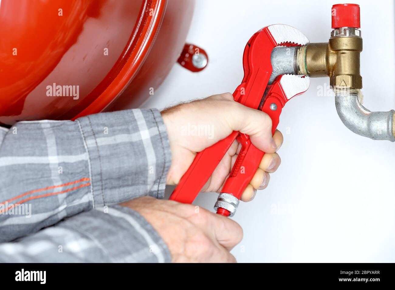 detail of a worker with tool in hand Stock Photo - Alamy