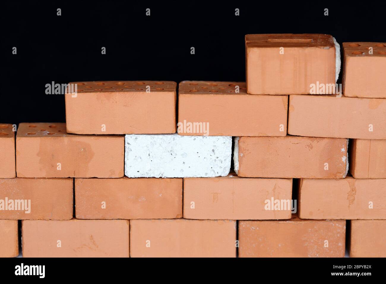 a brick wall with different colored bricks Stock Photo - Alamy