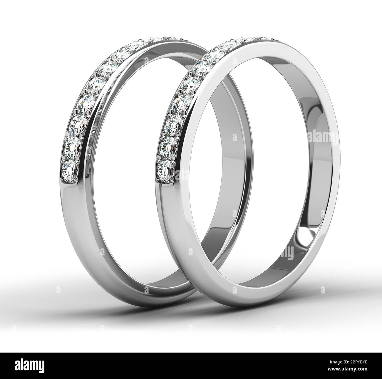 Two diamond wedding ring on white background Stock Photo - Alamy