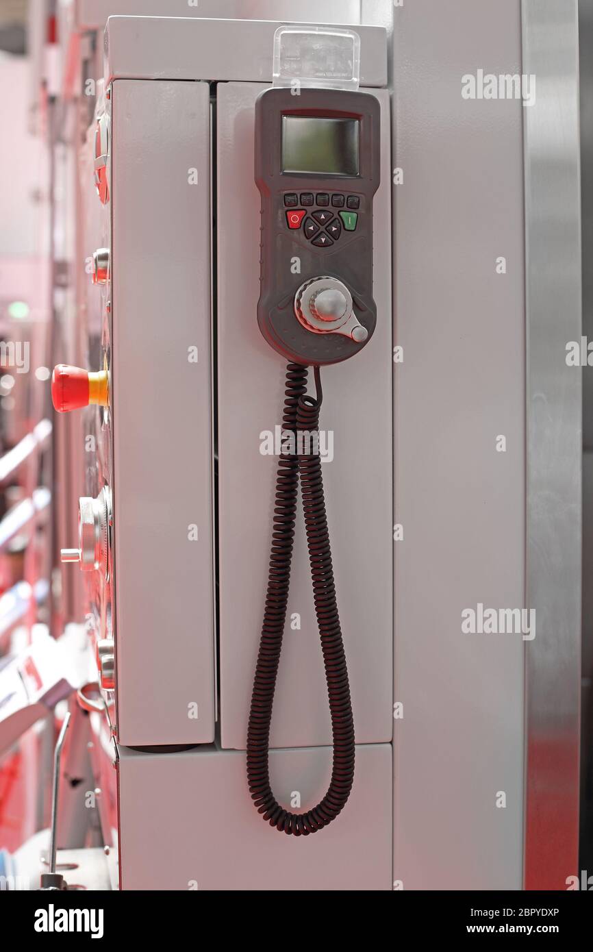 Wired Machine Remote Control With Display in Factory Stock Photo - Alamy