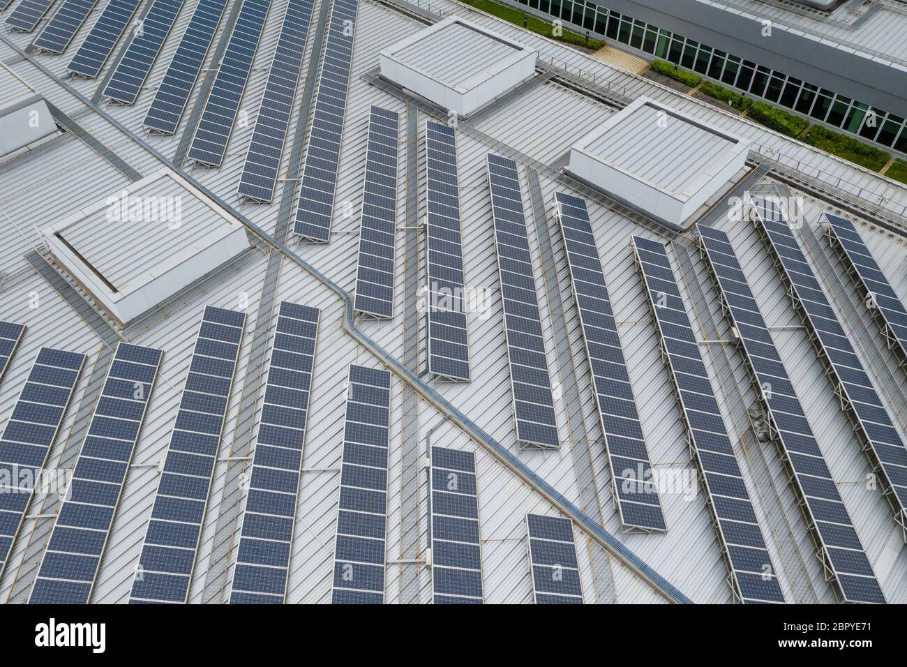 Top down view of Solar panel station on roof top building Stock Photo ...