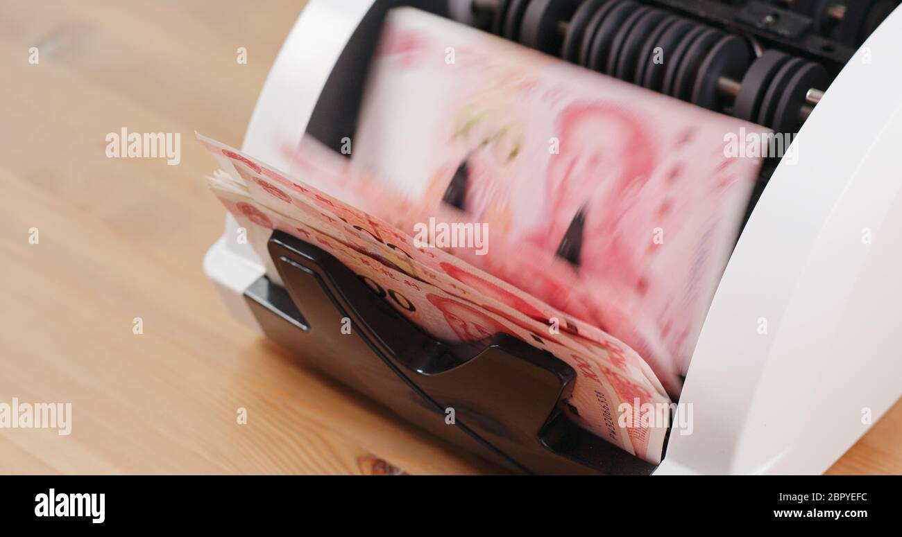 Chinese counting money hi-res stock photography and images - Alamy