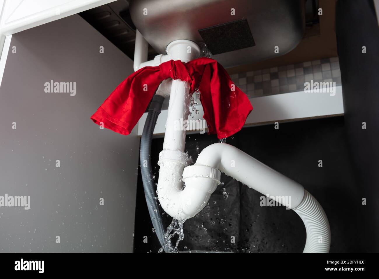Cloth under tap hi-res stock photography and images - Alamy