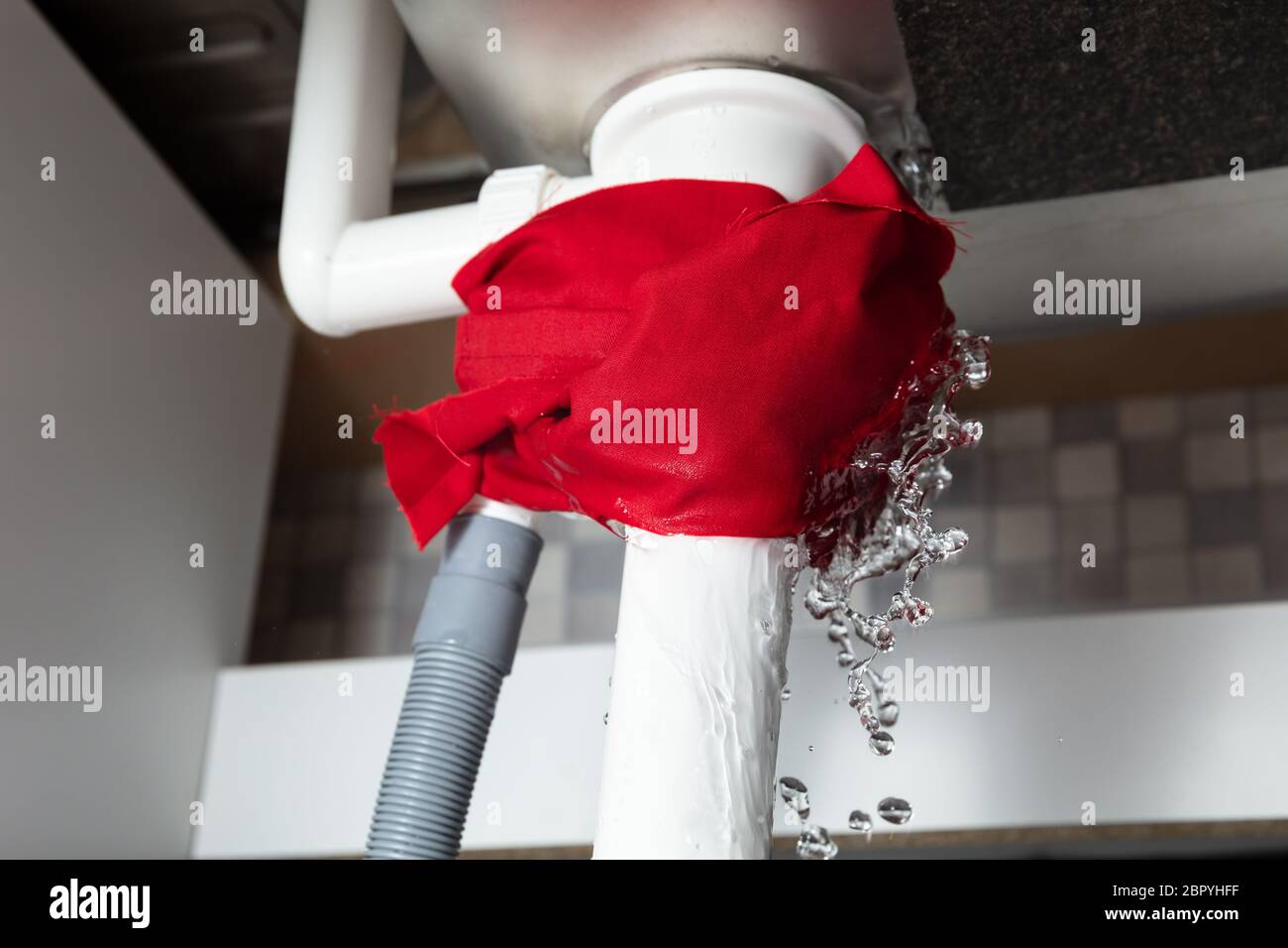 Cloth under tap hi-res stock photography and images - Alamy