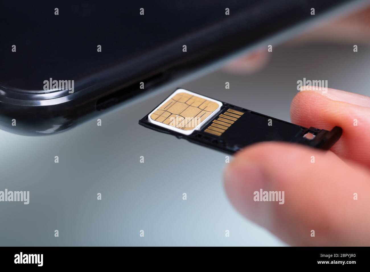 Inserting a sim card hi-res stock photography and images - Alamy