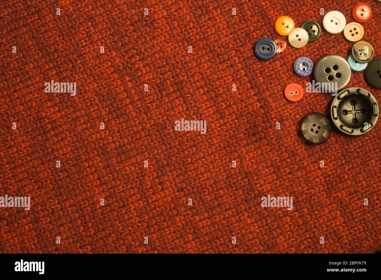 Various sewing buttons on textile background. copy space Stock Photo ...