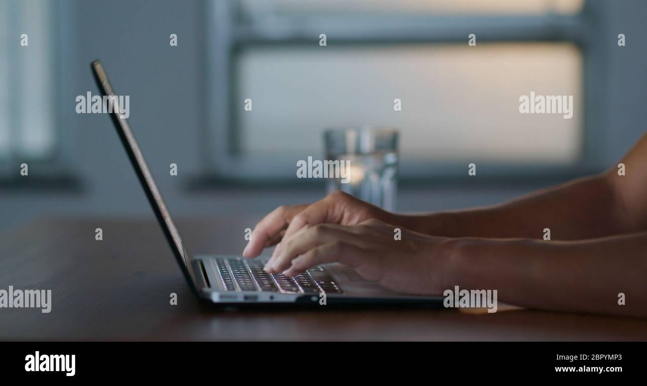 Work on laptop computer at home Stock Photo - Alamy