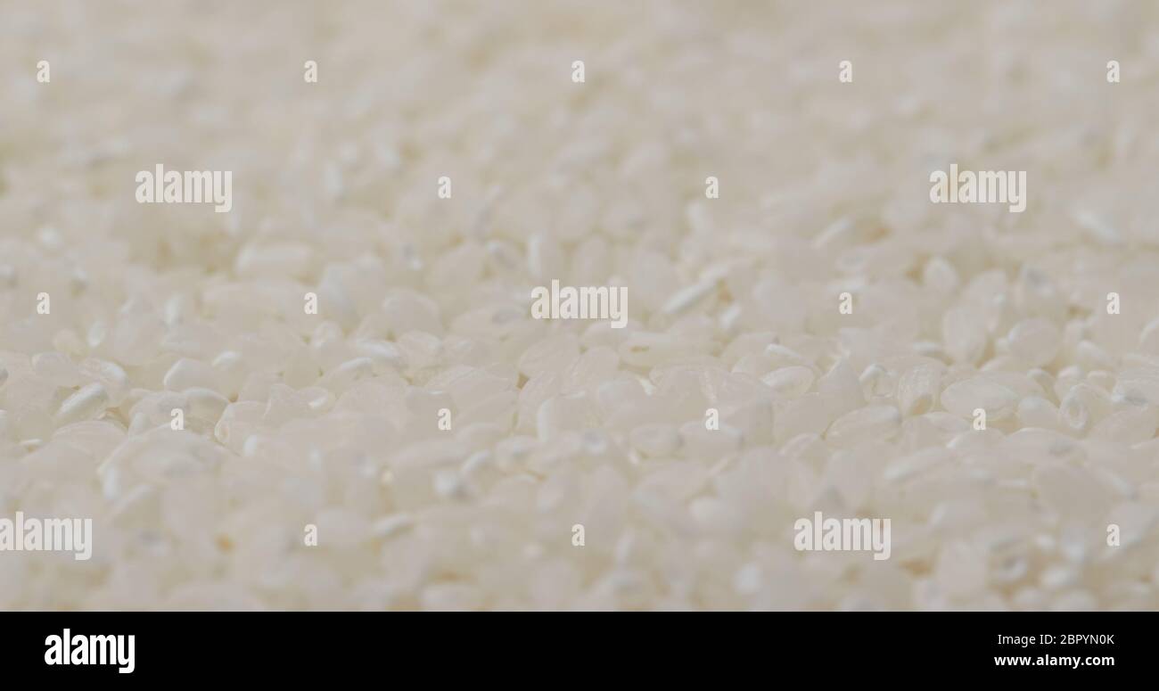 Heap of white rice Stock Photo - Alamy