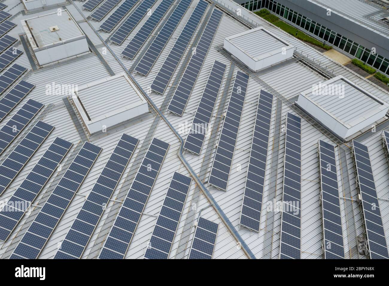 Top view of Solar panel station on roof top building Stock Photo - Alamy
