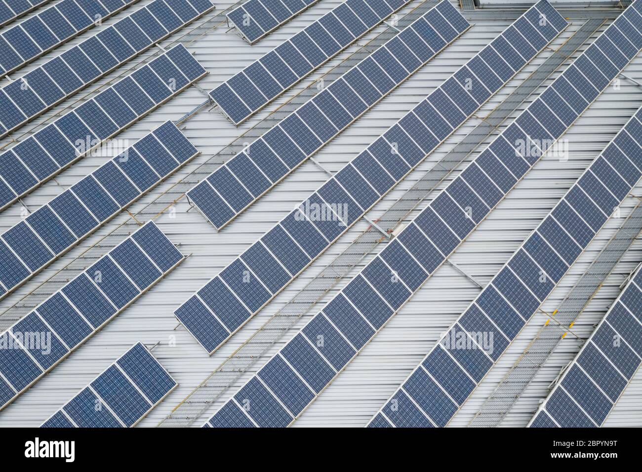 Aerial view of solar panel system on the roof top building Stock Photo ...