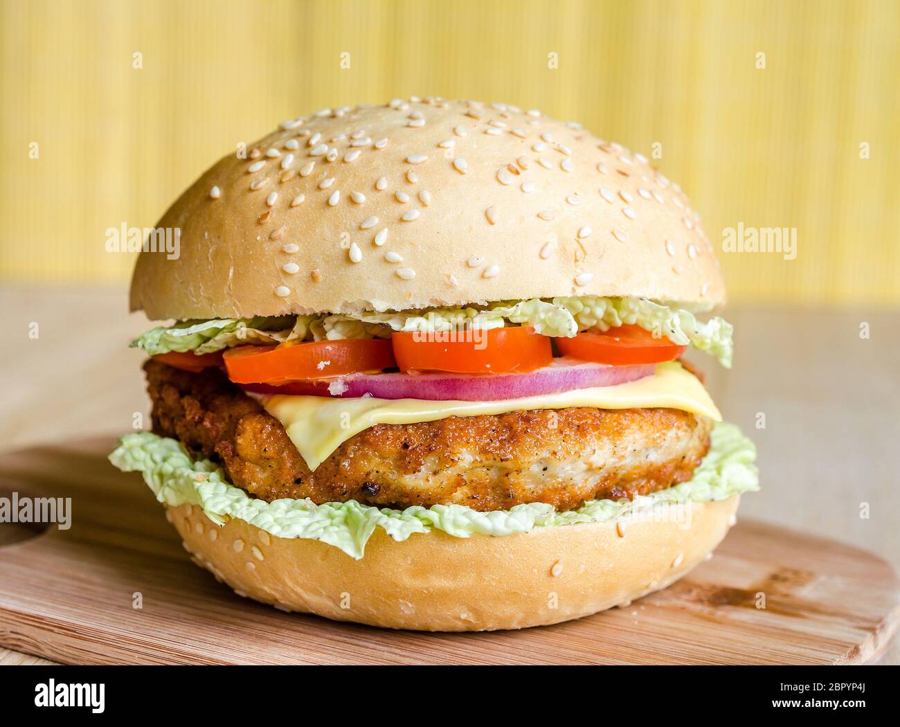 Triangle wholewheat-bun hamburger Stock Photo - Alamy