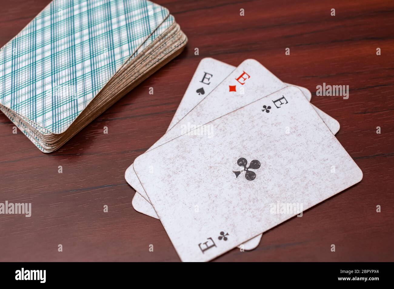 Play cards, three aces and a deck on the table. Card Solitaire Stock ...