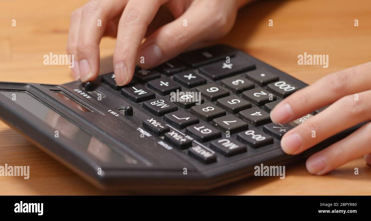 Use of calculator Stock Photo - Alamy
