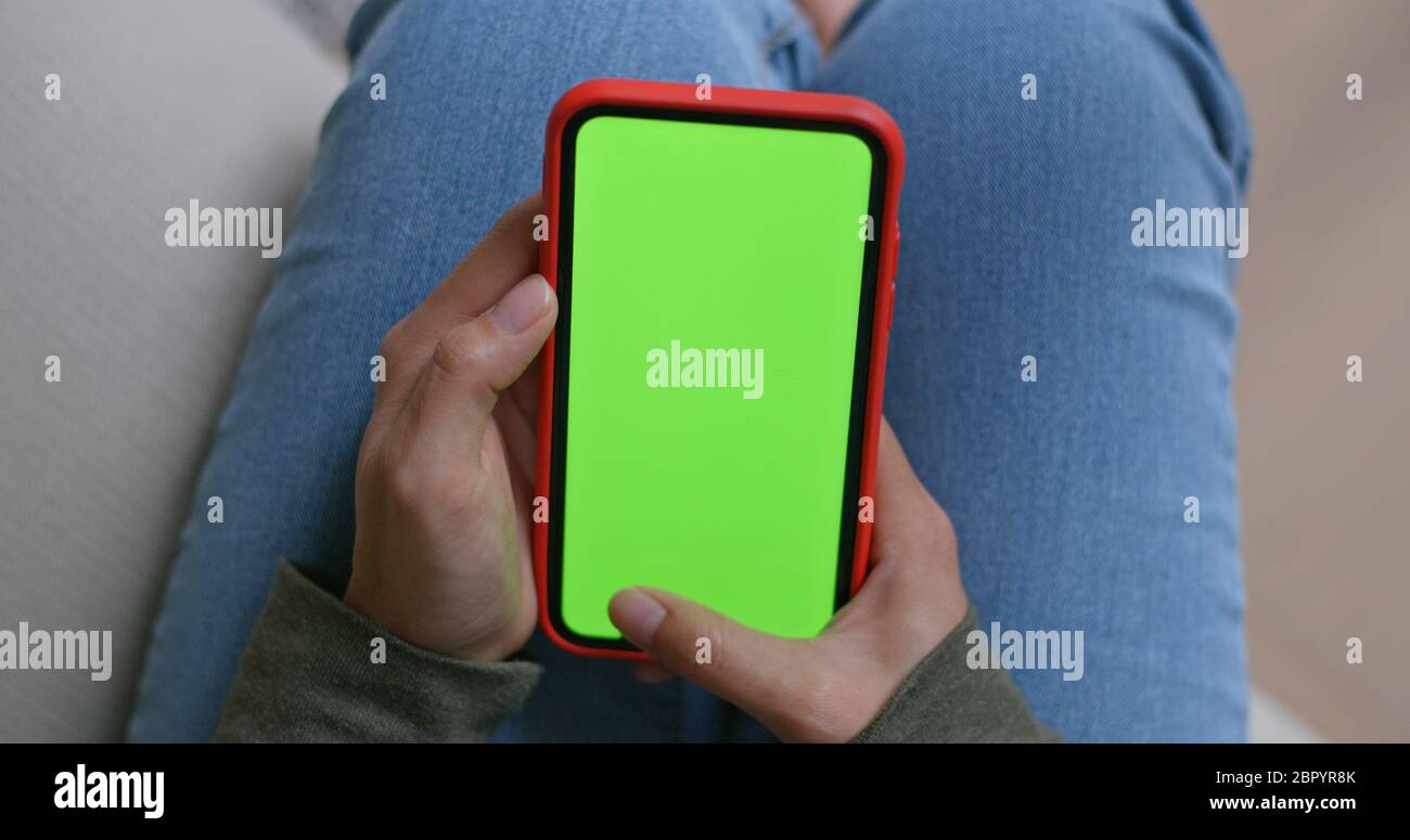 Using green screen smartphone inside hi-res stock photography and ...