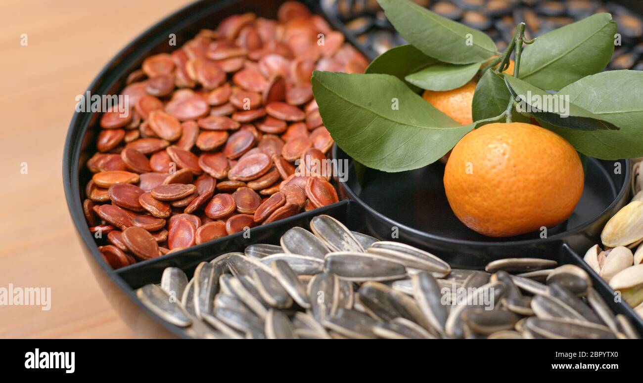 Lunar new year snack tray Stock Photo - Alamy