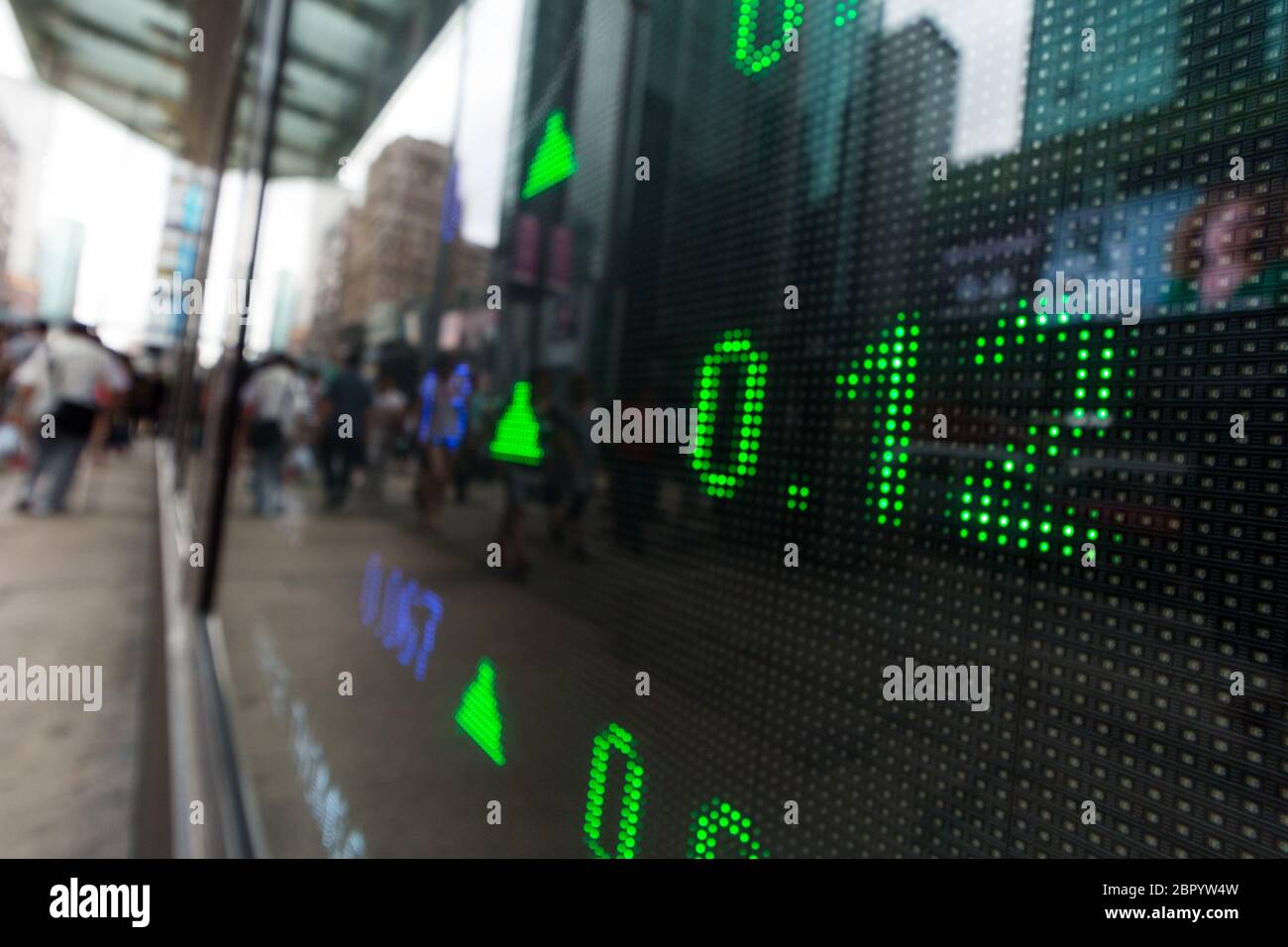 Stock market data on display screen in the city Stock Photo - Alamy