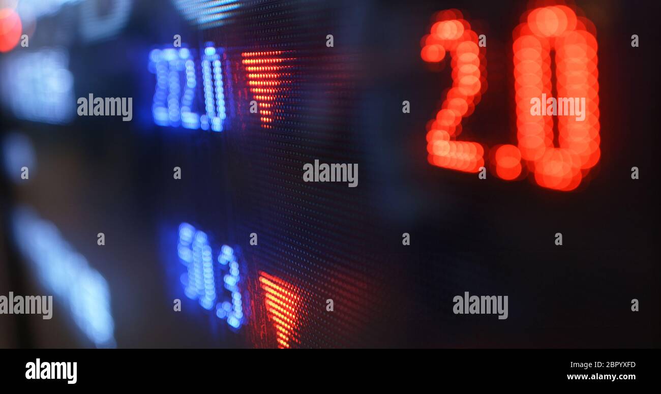 Stock market display screen in the city at night Stock Photo - Alamy