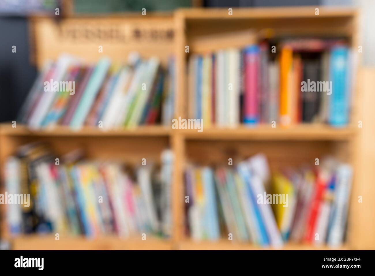 Blur view of bookshelf Stock Photo - Alamy