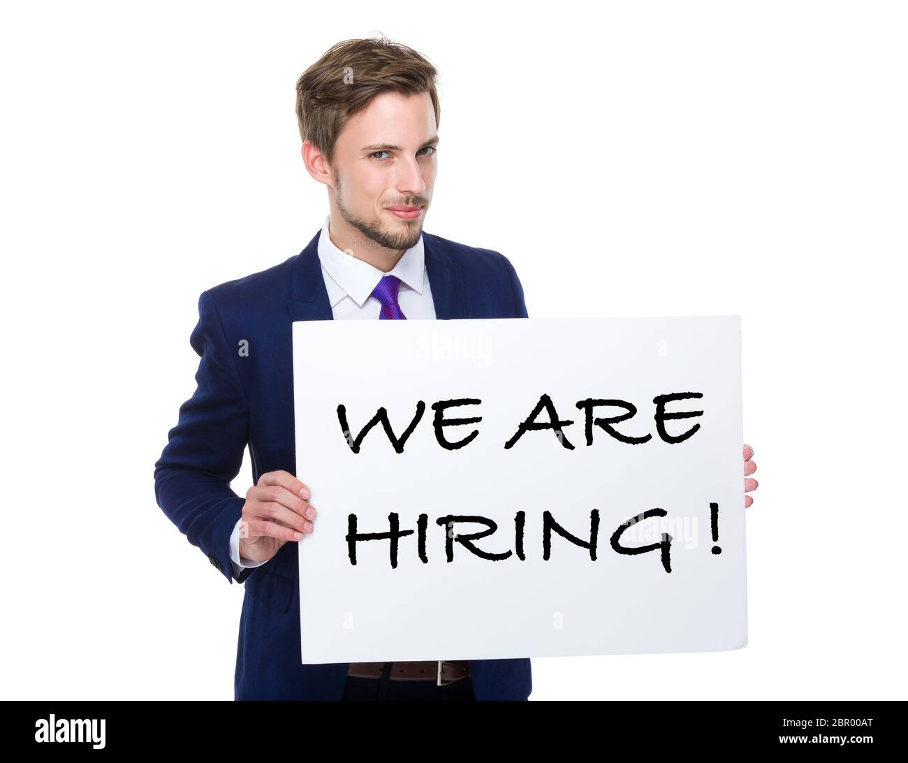 Businessman hold with white board showing phrase of we are hiring Stock ...