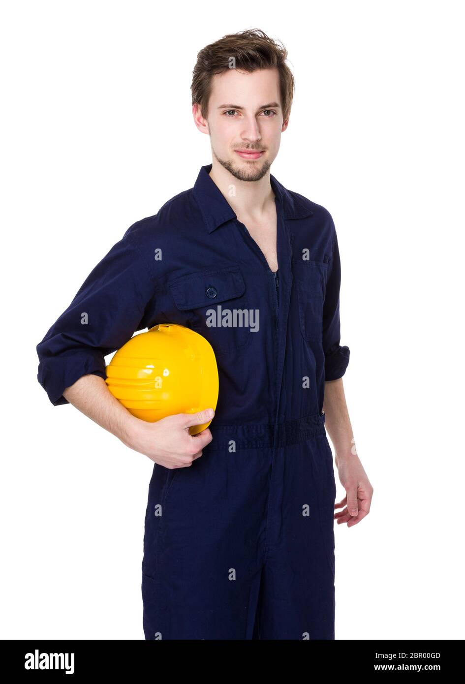 Engineer hold with yellow helmet Stock Photo - Alamy